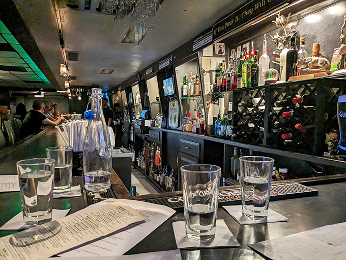 The bar at Fenicci's isn't just stocked—it's an arsenal of liquid possibilities waiting to complement whatever pasta masterpiece you've ordered.