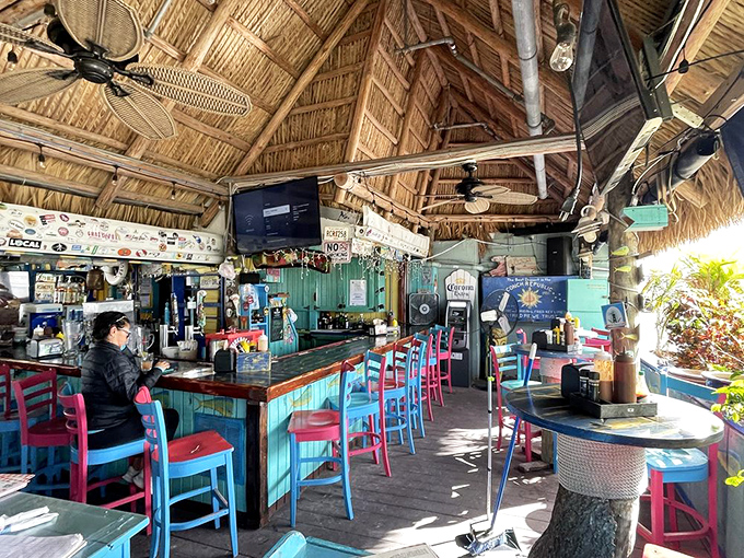The bar where stories get better with each round. Thatched roof overhead, colorful stools below, and endless possibilities in between.
