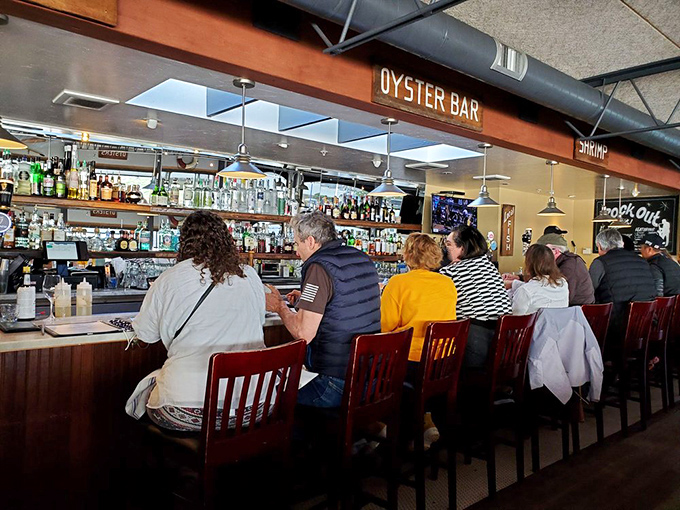 The oyster bar – where seafood pilgrims gather to worship at the altar of freshly-shucked bivalves and craft spirits.