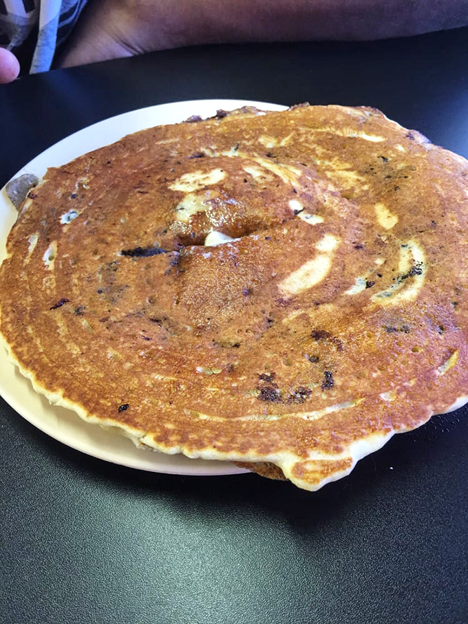 Blueberry pancakes where the berries actually show up to work, not just phone it in.