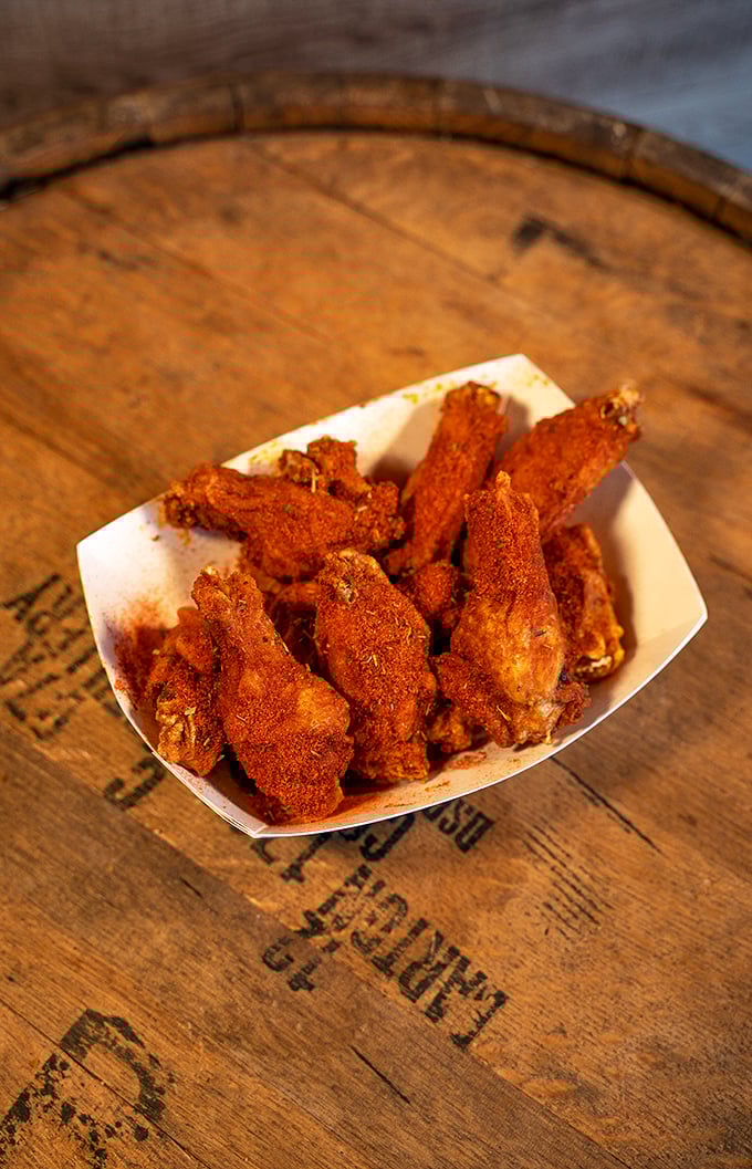 Wings that make you question your loyalty to all other wings. These crispy, spice-dusted beauties demand respect—and plenty of napkins.