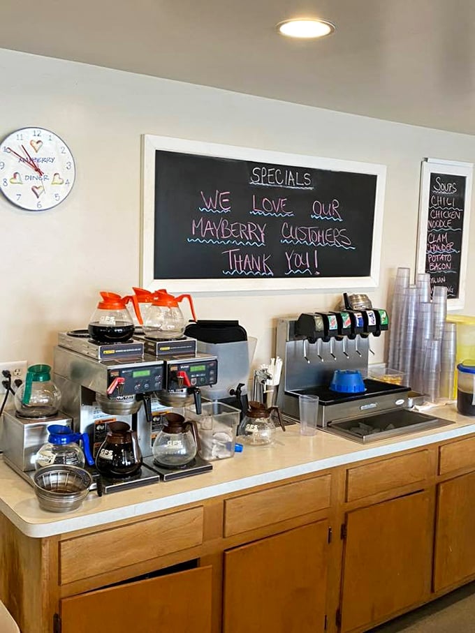 A chalkboard that says "WE LOVE OUR MAYBERRY CUSTOMERS" – the kind of sincere sentiment that's increasingly rare in our digital age. 