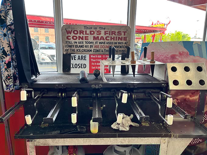 The world's first cone machine still doing its job after all these years—like the culinary equivalent of a reliable old friend.