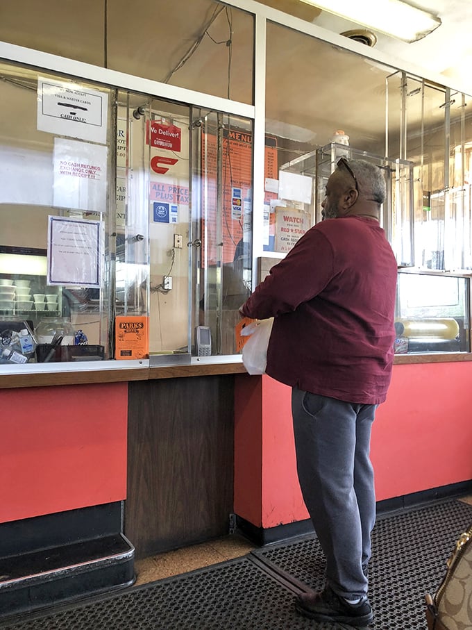 The ordering counter – where dreams are placed and shortly thereafter fulfilled. Notice nobody's checking their phone while waiting.