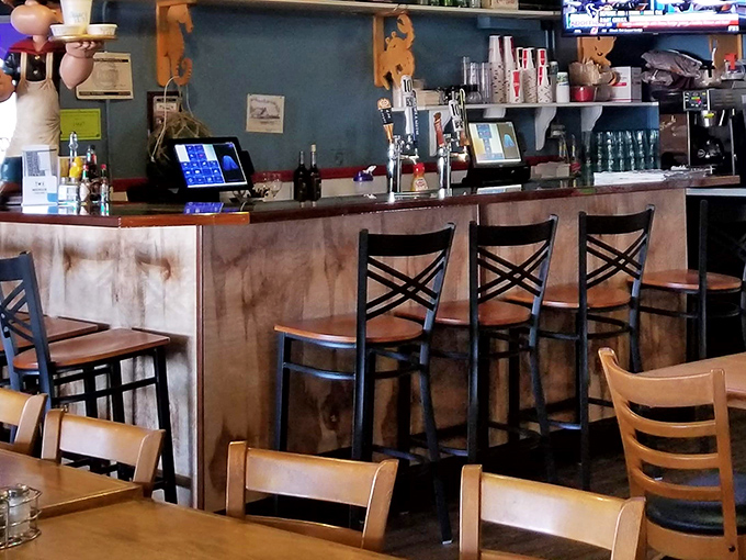 The bar invites you to pull up a stool and settle in for tales of the sea—and maybe another round of those incredible clam strips.
