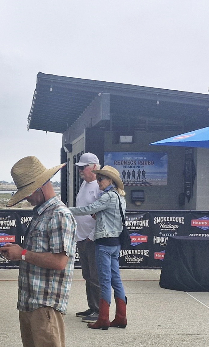 Cowboy hats and casual conversations while waiting for burger perfection. Sea Salt attracts a crowd that appreciates the finer points of beachside dining.
