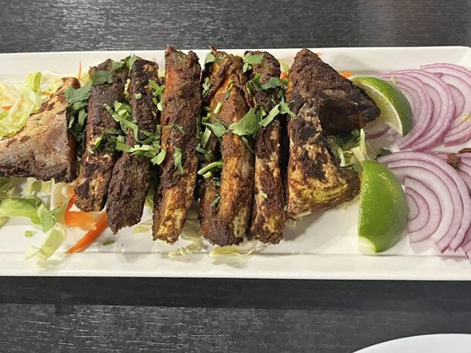 This isn't just fried fish – it's fish that's been given a spa treatment in spices before donning a crispy, golden evening gown.