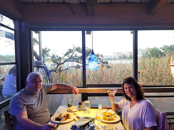 Window seats with marsh views make every meal feel like a special occasion. Nature's dinner theater at its finest.