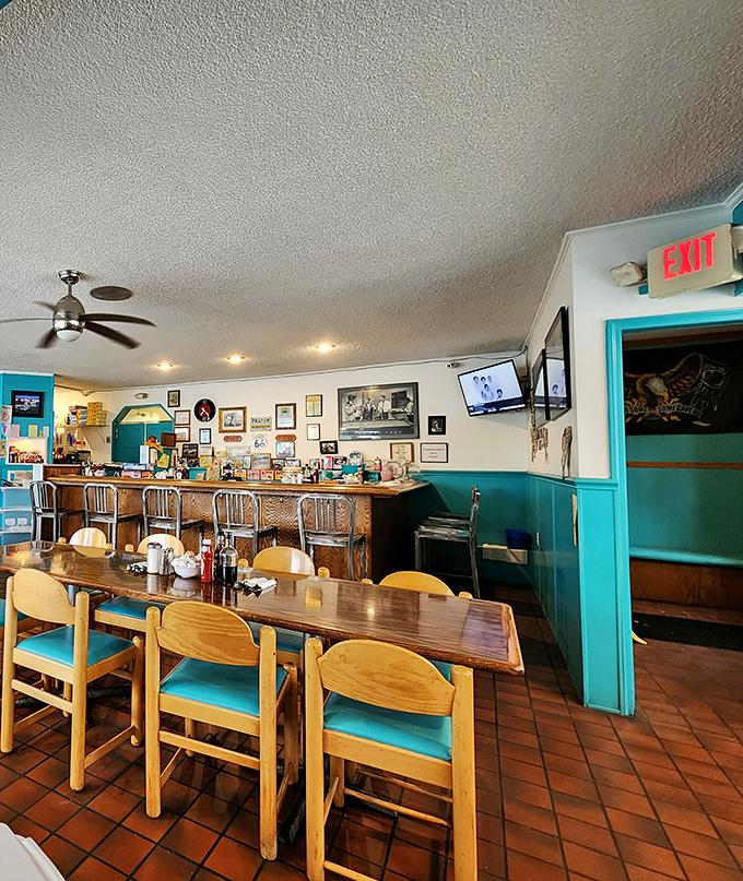 Where wooden chairs meet turquoise cushions, conversations flow as freely as the coffee. This isn't fast food—it's food worth slowing down for.