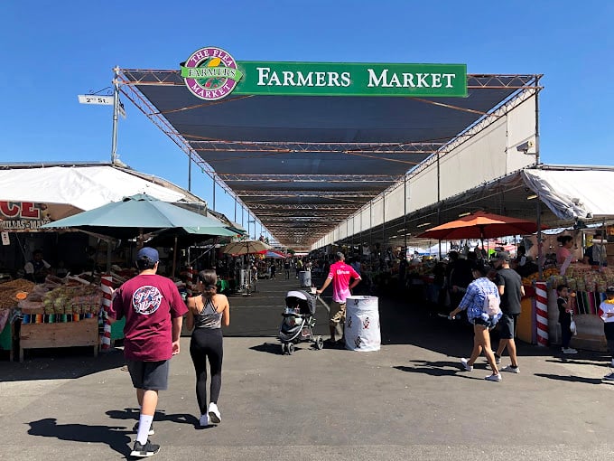 Bargain boulevard stretches before you! The Farmers Market section offers a shaded sanctuary of fresh finds and culinary curiosities.