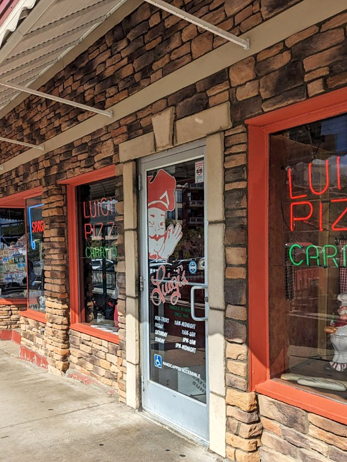The entrance promises what lies beyond—authentic Italian-American comfort food that's worth the wait. Those neon signs have guided hungry patrons for generations.