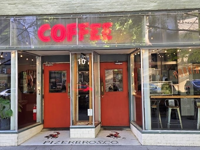 Those red doors aren't just an entrance to a café – they're a portal to a world where coffee is respected and breakfast is never rushed.