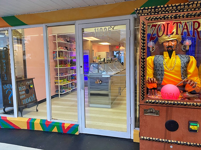 Zoltar and the love tester flank the entrance like guardians of fun, promising both fortune-telling and ice cream—the two essential vacation activities.