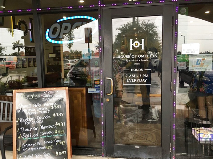 The doorway to breakfast paradise, complete with purple mood lighting. Those specials on the chalkboard are practically winking at you.