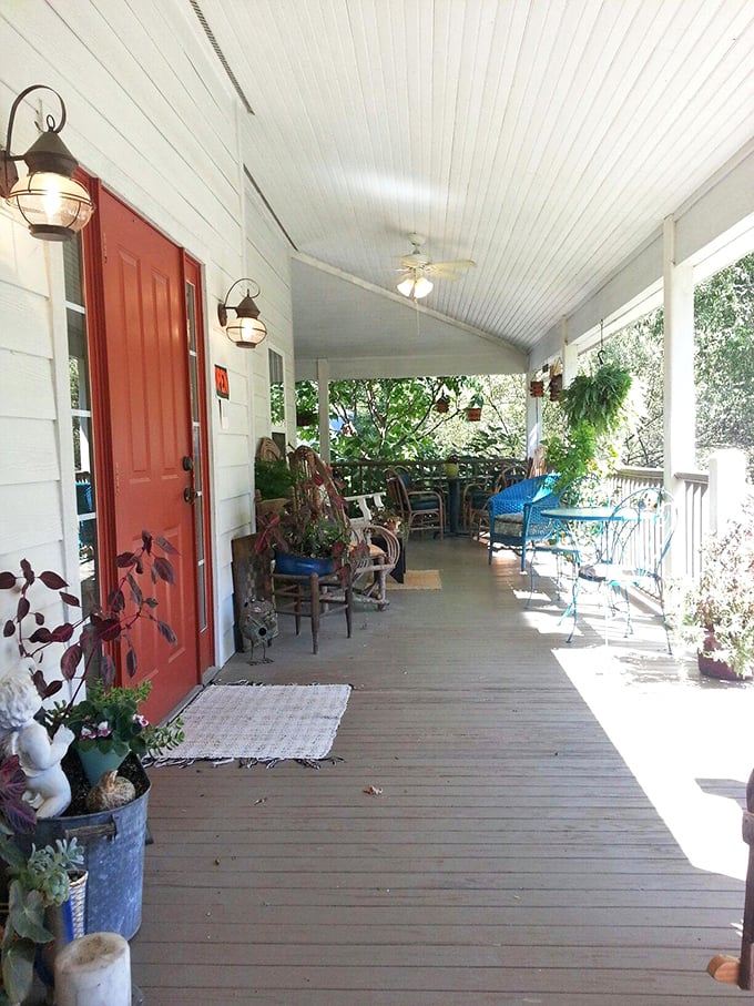 The entrance porch – where rocking chairs invite you to slow down and savor both your sandwich and the simple pleasure of doing nothing.