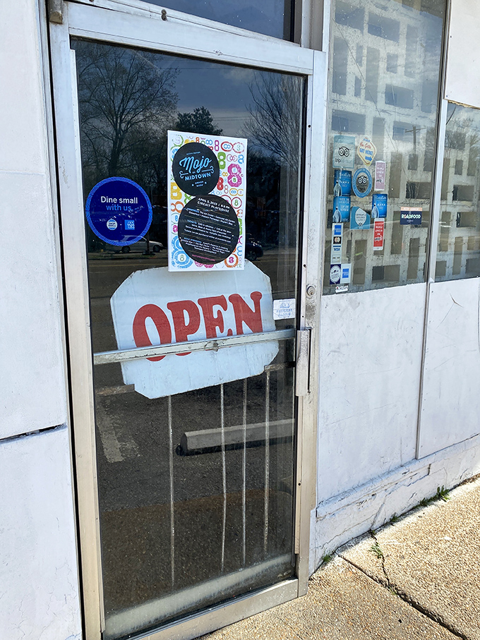 The "OPEN" sign—possibly the most beautiful word in the English language when it's hanging on the door of a legendary barbecue joint.