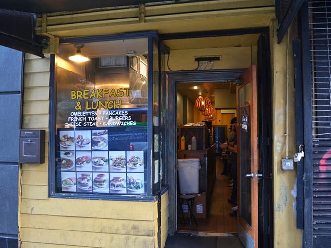 The yellow exterior and menu display window offer a glimpse of what awaits inside. Like a breakfast speakeasy, you need to know what you're looking for.