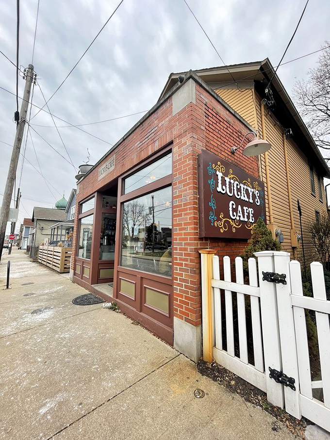 The white picket fence and wooden sign offer a warm Midwestern welcome that says, "Yes, you've found the place all those food blogs were raving about."