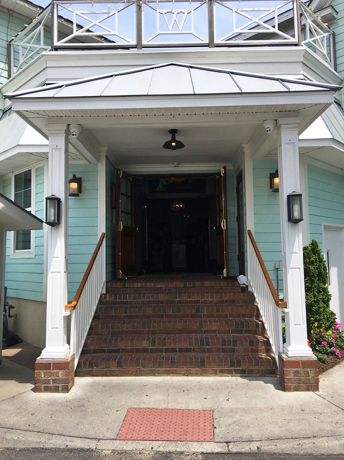 A grand entrance worthy of the culinary treasures within – brick steps lead you into a seafood sanctuary that's been perfecting its craft for decades.