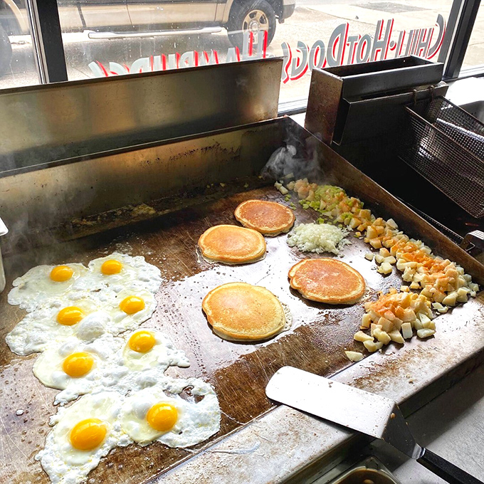 The flat-top grill—where breakfast dreams come true and pancakes achieve that perfect golden-brown hue that Instagram filters try to replicate.