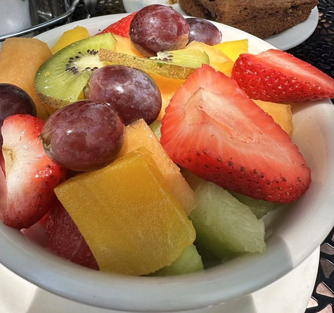 A fruit bowl that doesn't just check the "healthy option" box—it celebrates it with vibrant colors and freshness that makes you feel virtuous and indulgent simultaneously. 