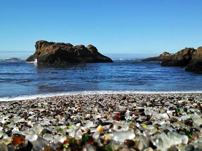 Glass Beach sparkles with nature's alchemy—where yesterday's discarded bottles have become today's treasure hunt of sea-polished jewels in every color imaginable.