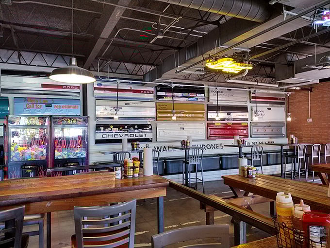 The repurposed car parts on the wall aren't just decoration—they're conversation starters. "Remember when dashboards looked like that?" Yes, yes I do.