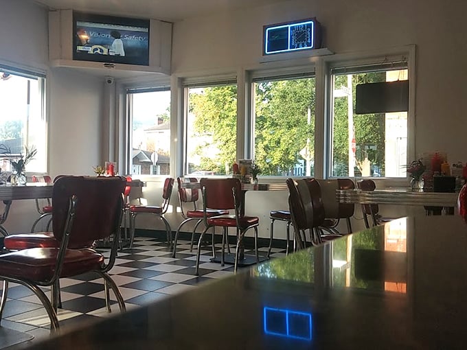Morning light streams through windows illuminating empty tables that won't stay that way for long. The calm before the delicious storm.