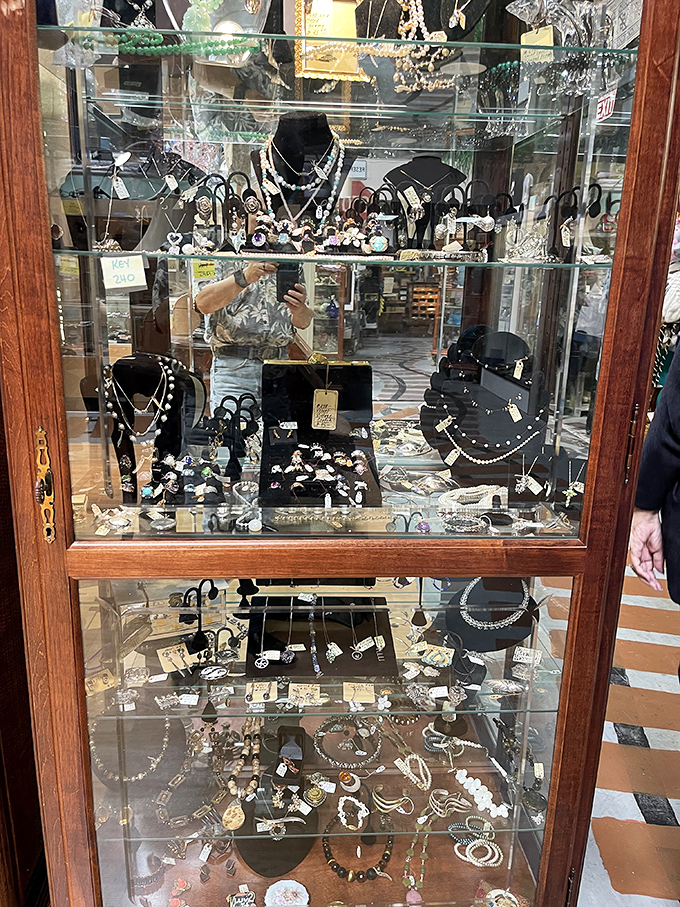 Jewelry displays that sparkle with history. Each necklace and ring represents someone's special occasion, now waiting for its second act.