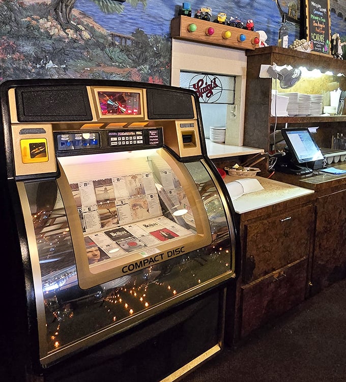 The vintage jukebox stands as a chrome-and-lights reminder that some pleasures—like good music with good food—never need upgrading.