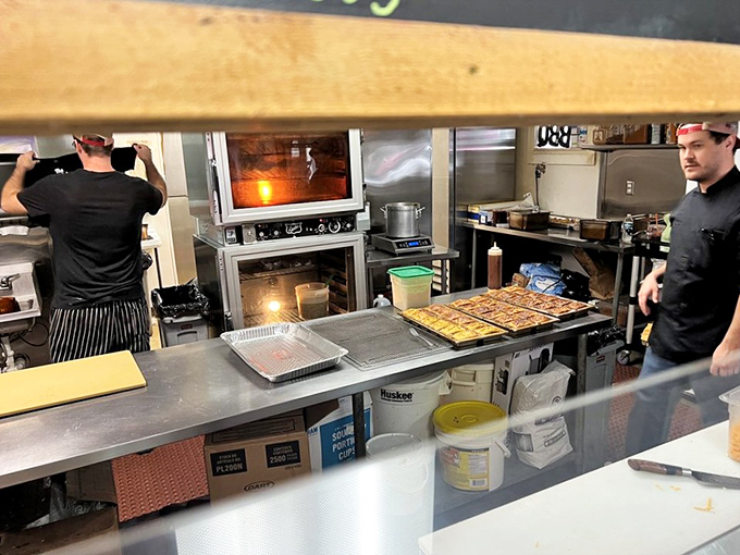 Behind the scenes where the real magic happens – smoke, fire, and culinary expertise colliding beautifully.