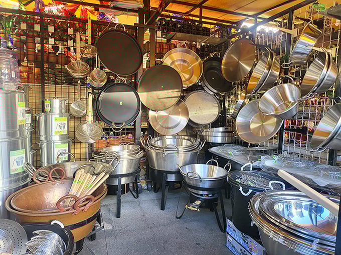 Pots and pans hanging like metallic modern art—cooking equipment that could handle anything from Sunday menudo to feeding an army.
