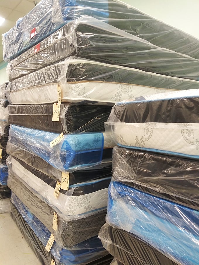 Mattress mountain: where dreams come at discount prices, and the phrase "barely used" takes on new, slightly concerning dimensions.