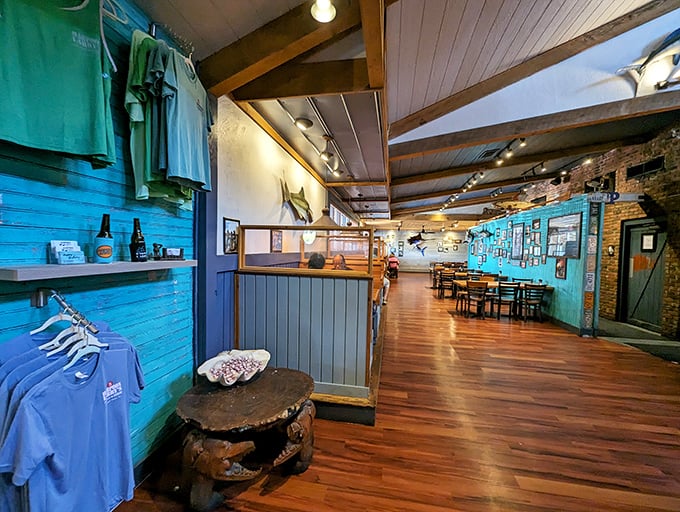 The turquoise walls and maritime decor aren't just ambiance—they're a promise that you've found authentic coastal dining in Virginia.