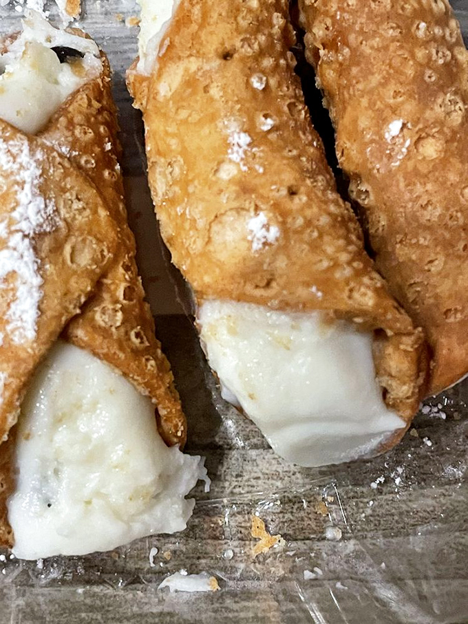 These mini cannoli bring a sweet Italian finale – crispy shells filled with creamy ricotta that'll make you forget calories exist.