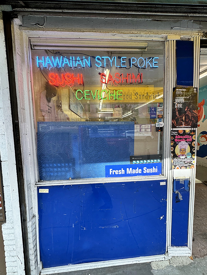 Neon lights announce "HAWAIIAN STYLE POKE" and "SUSHI" like a Vegas sign for seafood lovers – less glitz, more fish, all satisfaction.