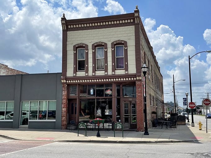 Sunshine bathes the historic façade of Lindberg's Tavern, a cornerstone of Springfield's Commercial Street that's weathered decades while staying deliciously relevant.