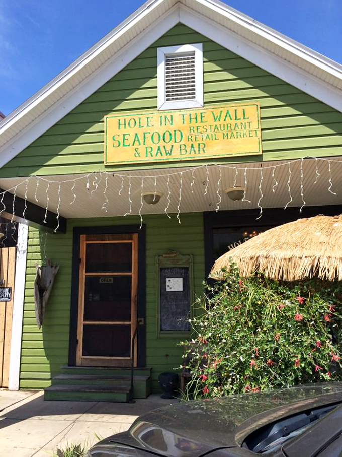 The sign promises seafood, a raw bar, and retail market—a triple threat of Gulf treasures that delivers more satisfaction than any five-star establishment with unpronounceable menu items.