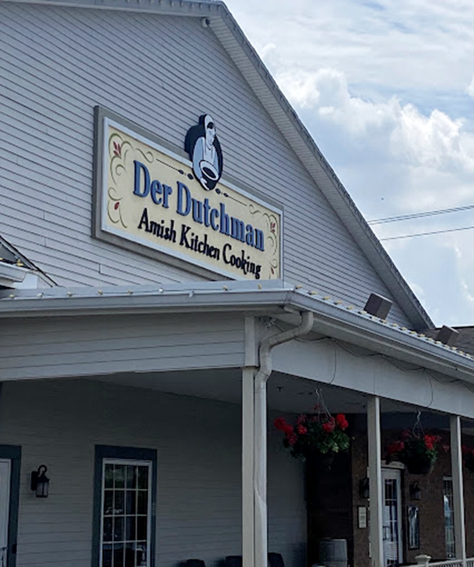 The iconic Der Dutchman sign against a cloudy Ohio sky—a beacon of hope for the hungry traveler.