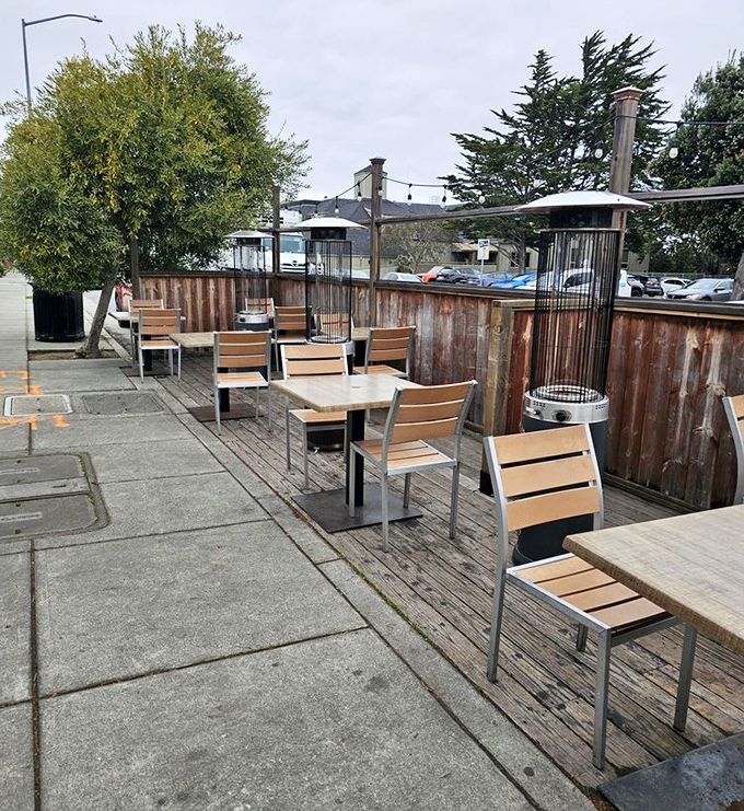 Outdoor seating where the Pacific breeze seasons your meal with salt air—nature's perfect finishing touch to seafood.