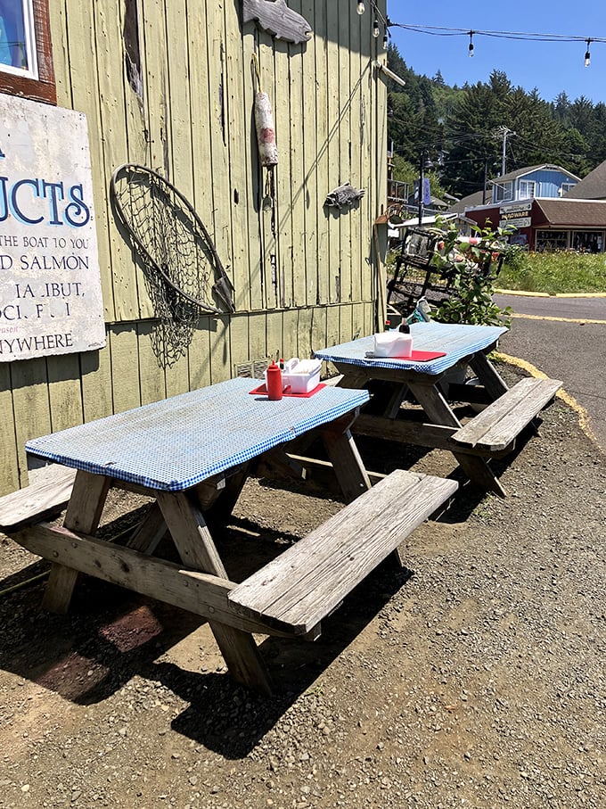 Picnic tables adorned with fishing nets and coastal artifacts—dining with a side of maritime history and ocean breezes.