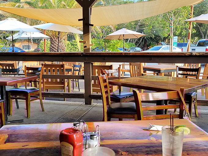 Outdoor seating that captures California's perfect weather – where every table offers a chance to dine al fresco under gentle shade sails.