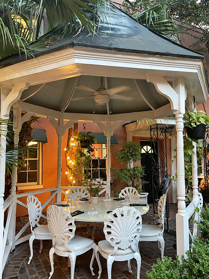 The courtyard gazebo transforms into a twinkling wonderland at night—the perfect setting for a romantic dinner or celebration under Charleston's starry skies.