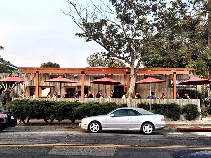 The exterior says "laid-back beach shack" but the food inside whispers "we take seafood very seriously" – California coastal dining at its finest.