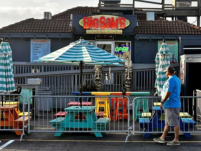 The outdoor seating area's rainbow of picnic tables isn't trying to be Instagram-famous—they've been bringing color to meals since before filters were invented.