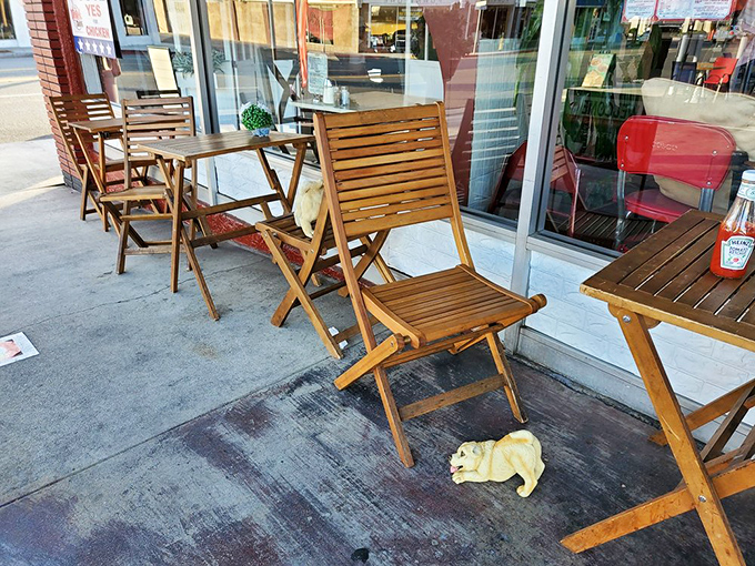 Even the outdoor seating has that no-nonsense charm. No fancy umbrellas or string lights—just a place to commune with exceptional chicken.