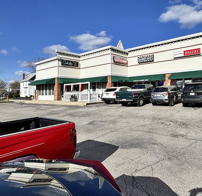 The unassuming strip mall exterior hides culinary treasures within – like finding a Lamborghini parked in your neighbor's garage.