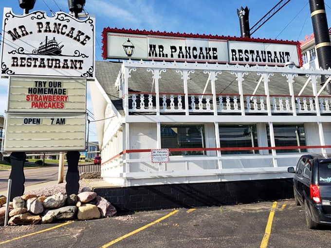 The exterior view reveals the full steamboat fantasy—a breakfast vessel permanently docked in the Dells, ready to serve up morning delights.