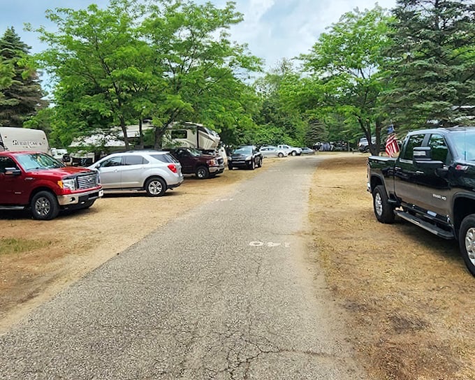 Parking with purpose: Even the lot at Van Buren State Park offers glimpses of green canopy—nature's way of saying "you've arrived somewhere special."