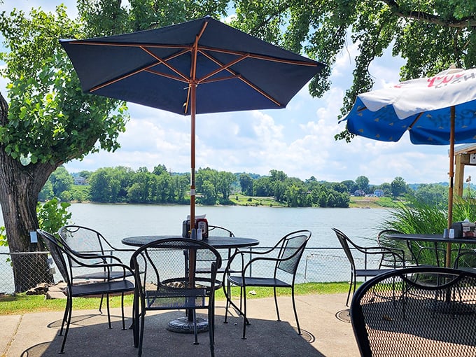 The riverside patio offers scenic dining that makes every meal feel like a vacation.